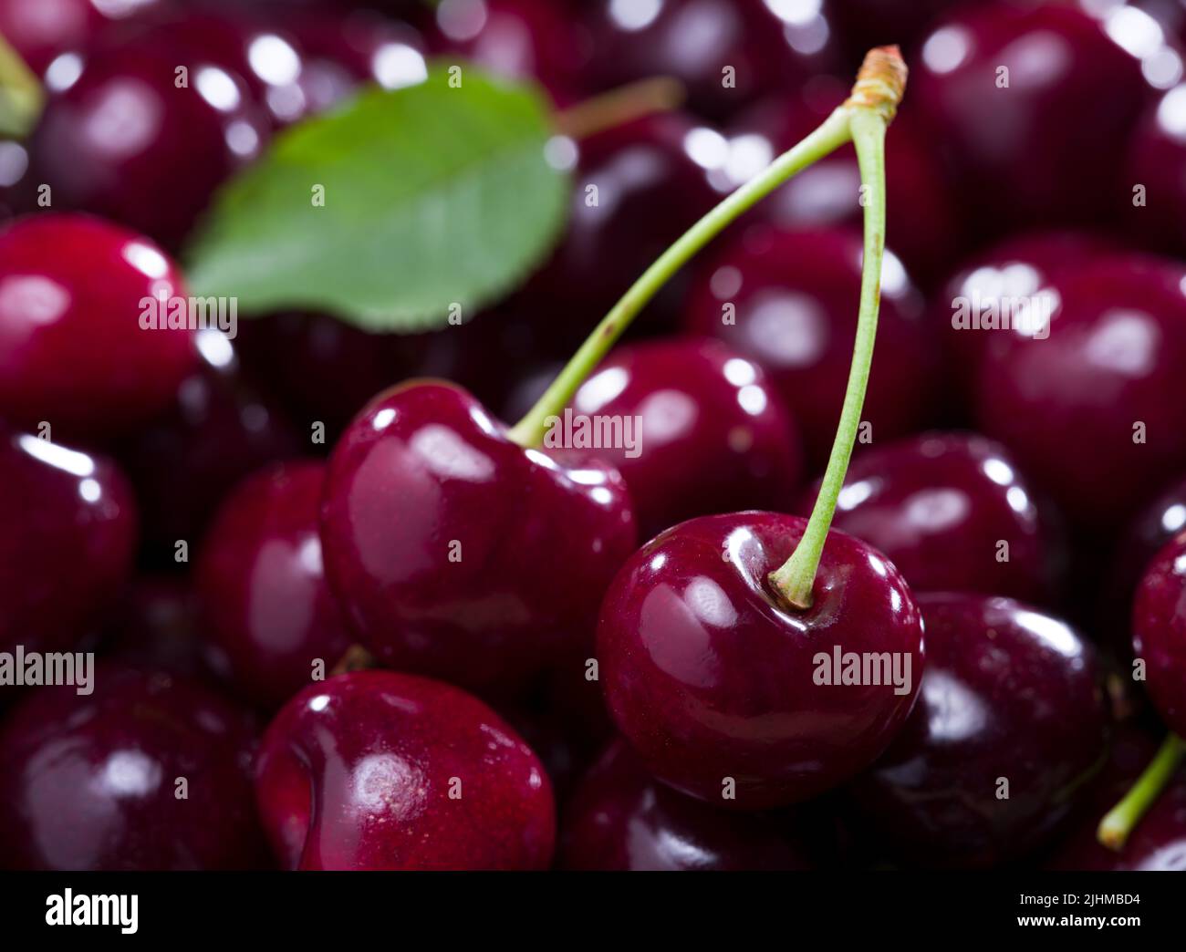 Sweet cherry background. Full-frame close-up shot Stock Photo - Alamy