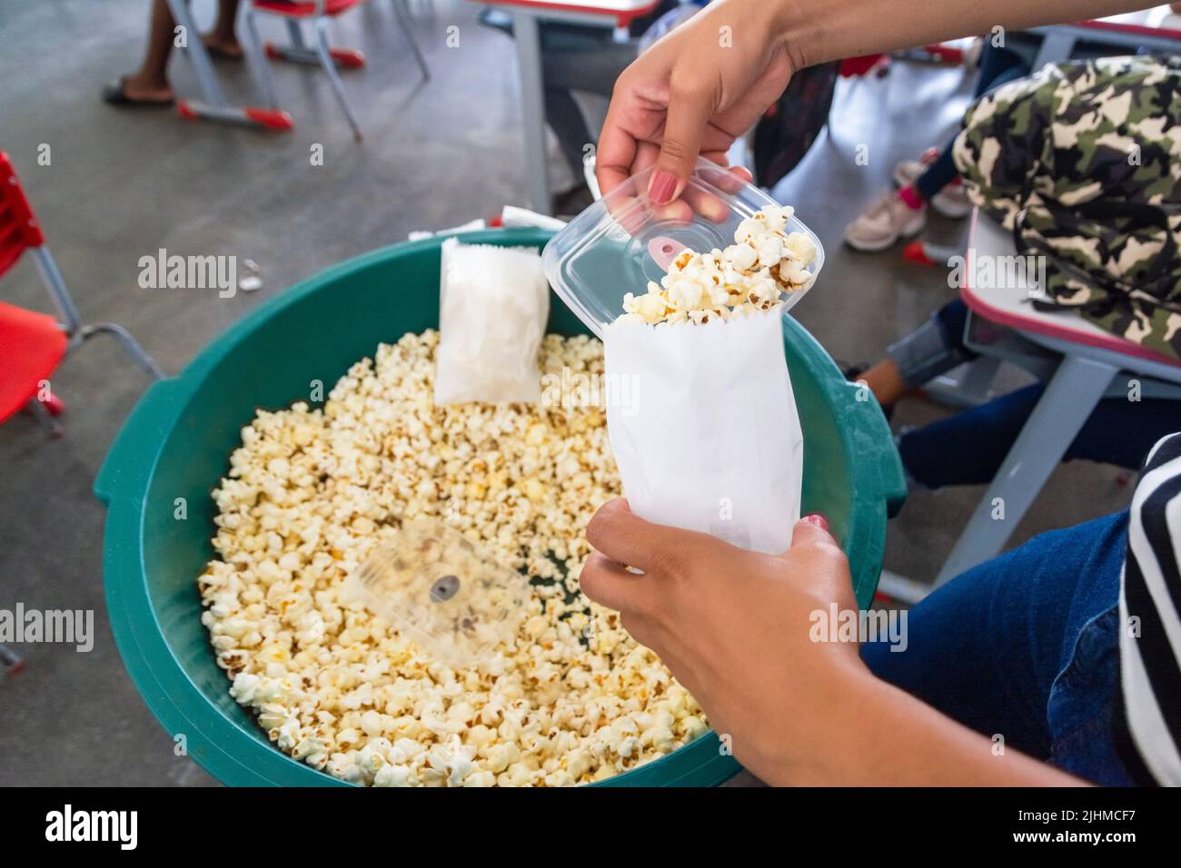 Salty popcorn being served to students at a public school on their ...
