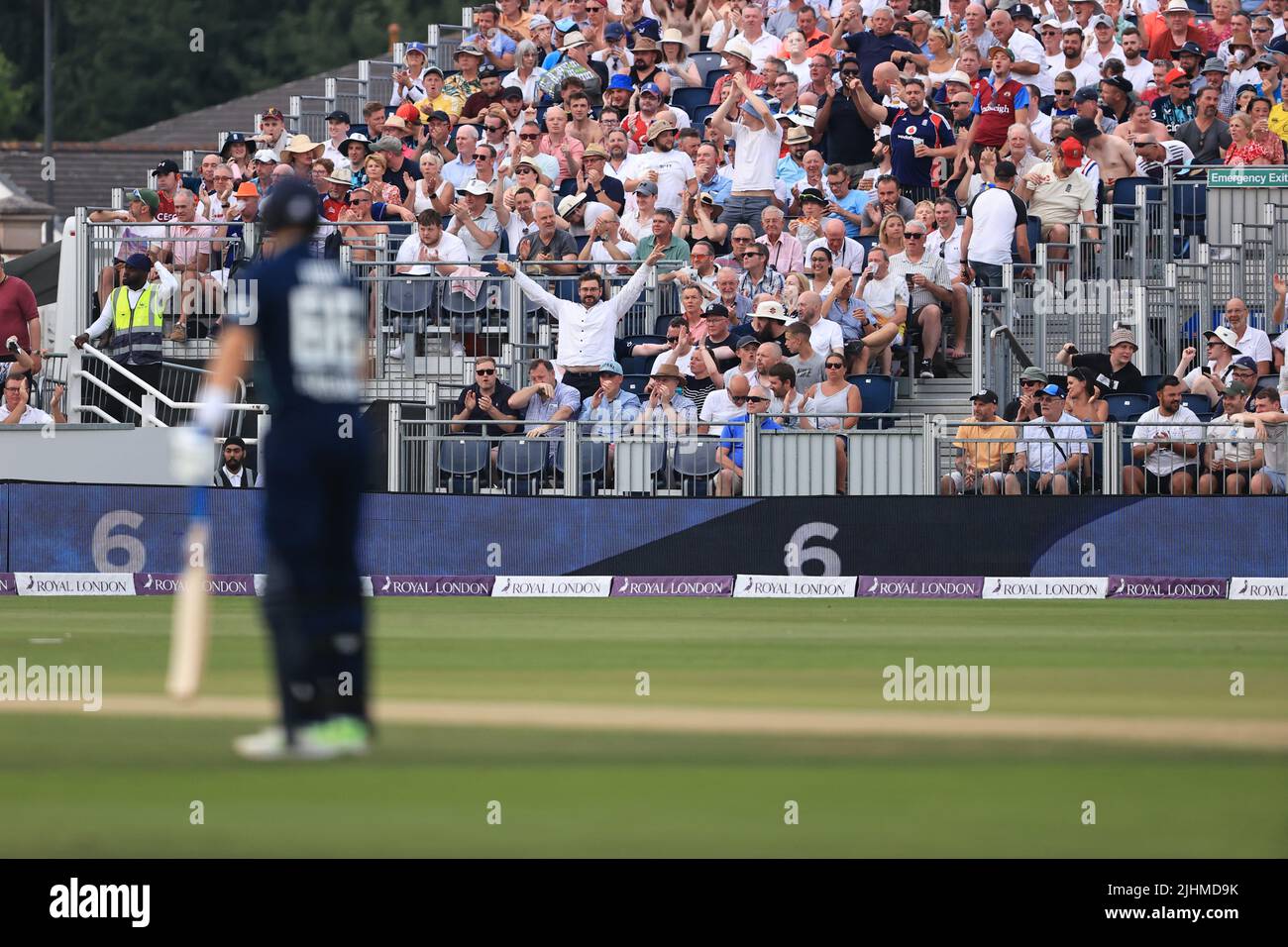A England fan signals a six after Joe Root of England hits a peach of a ...