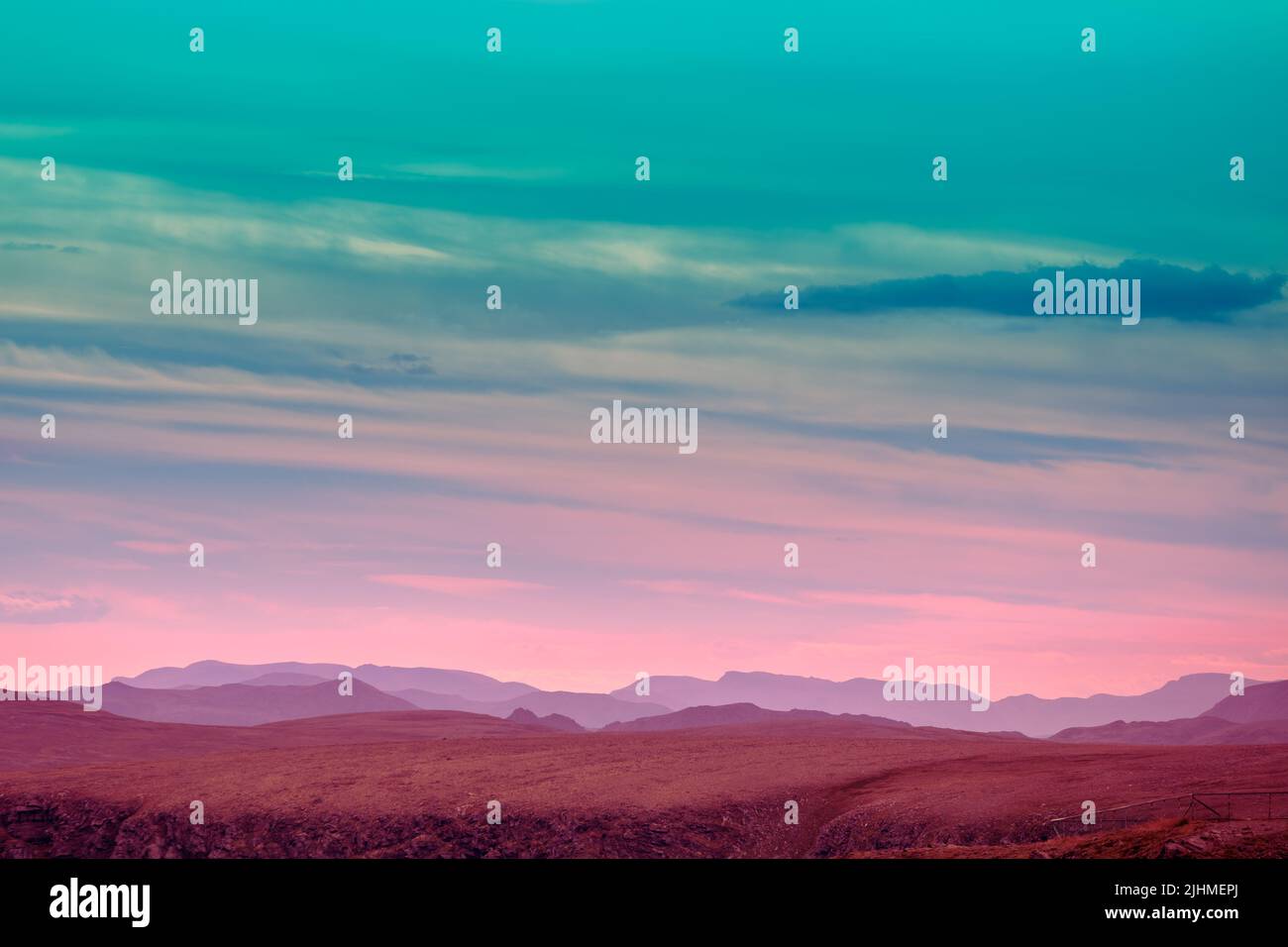 Silhouette of mountain ridge against sunset sky Stock Photo - Alamy