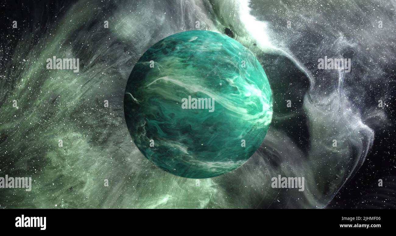 Image of green planet in green galaxy Stock Photo - Alamy
