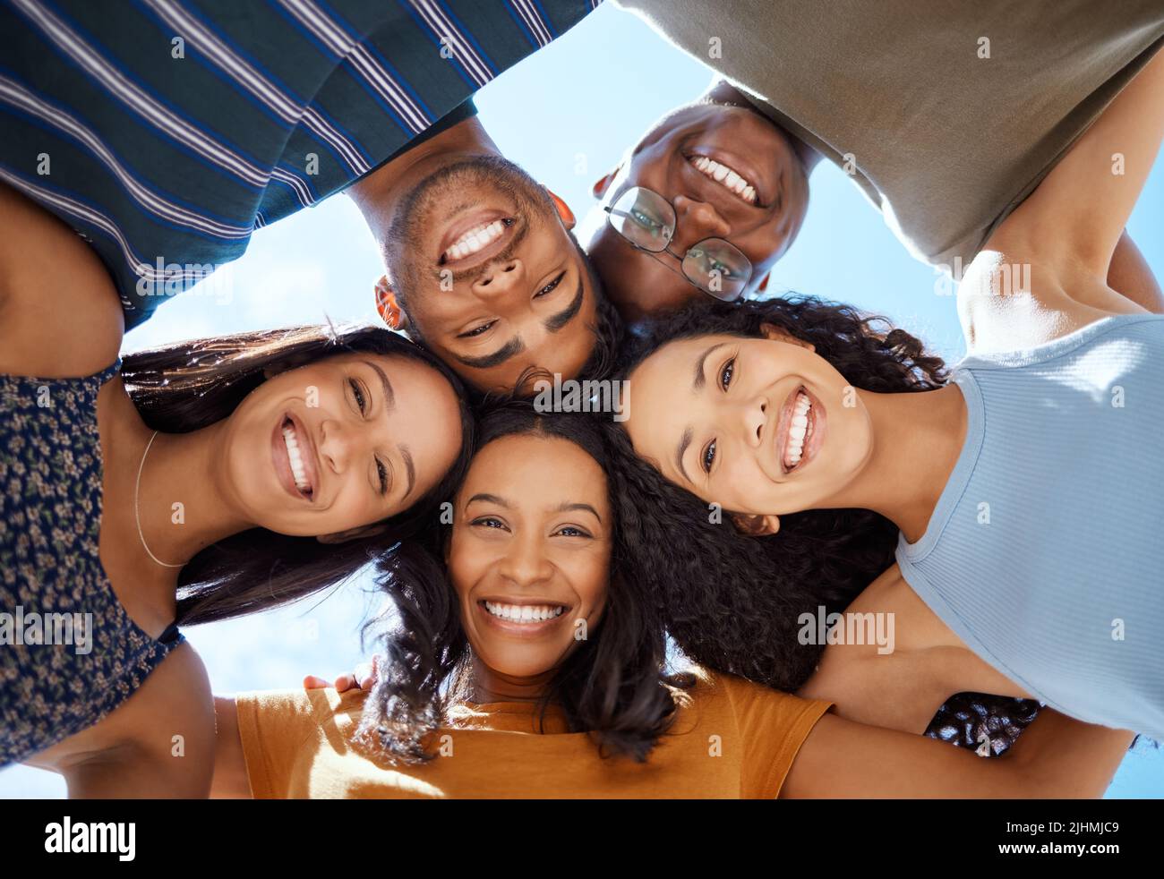 The only way to have a friend is to be one. Low angle shot of a group ...