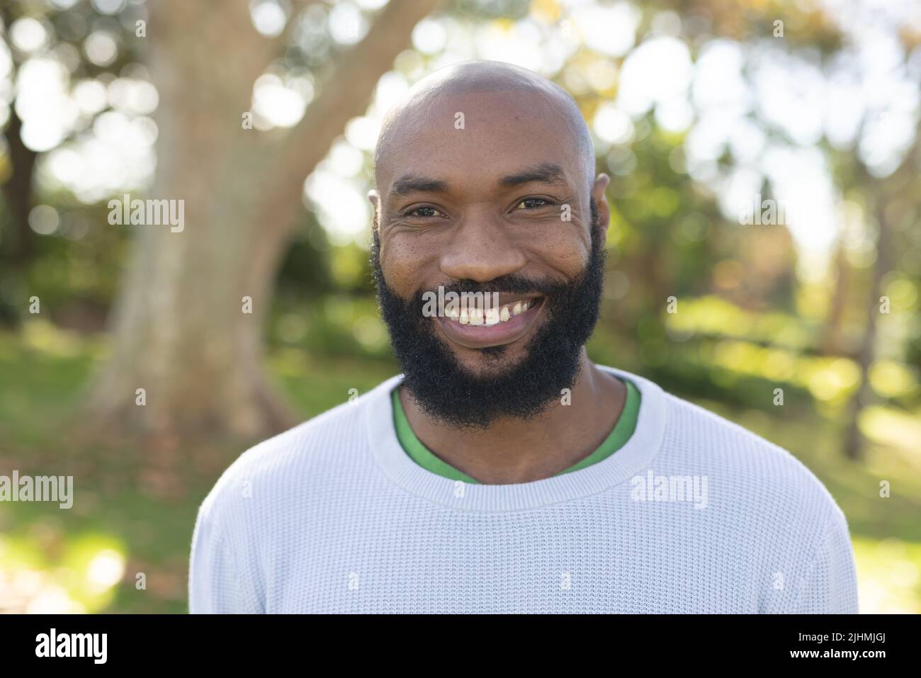 Image of happy african american man smiling at camera Stock Photo - Alamy