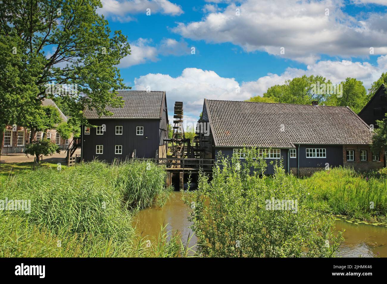 Beautiful traditional old ancient watermill, dutch rural countryside ...