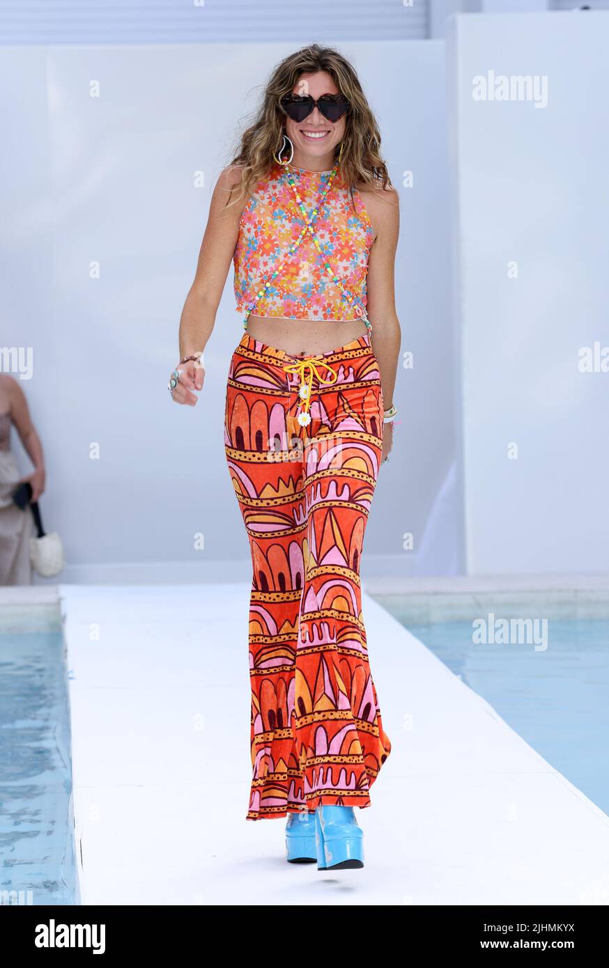 MIAMI BEACH, FLORIDA - JULY 18: Designer Emily Bargeron walks the ...