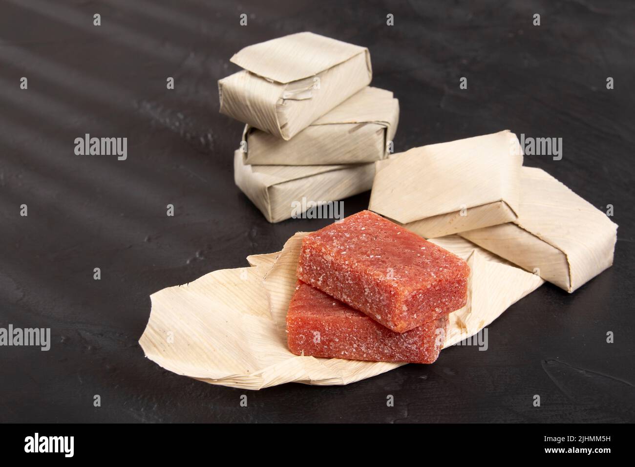 Guava Paste Wrapped in Bijao Leaf; Photo On Black Background Stock ...