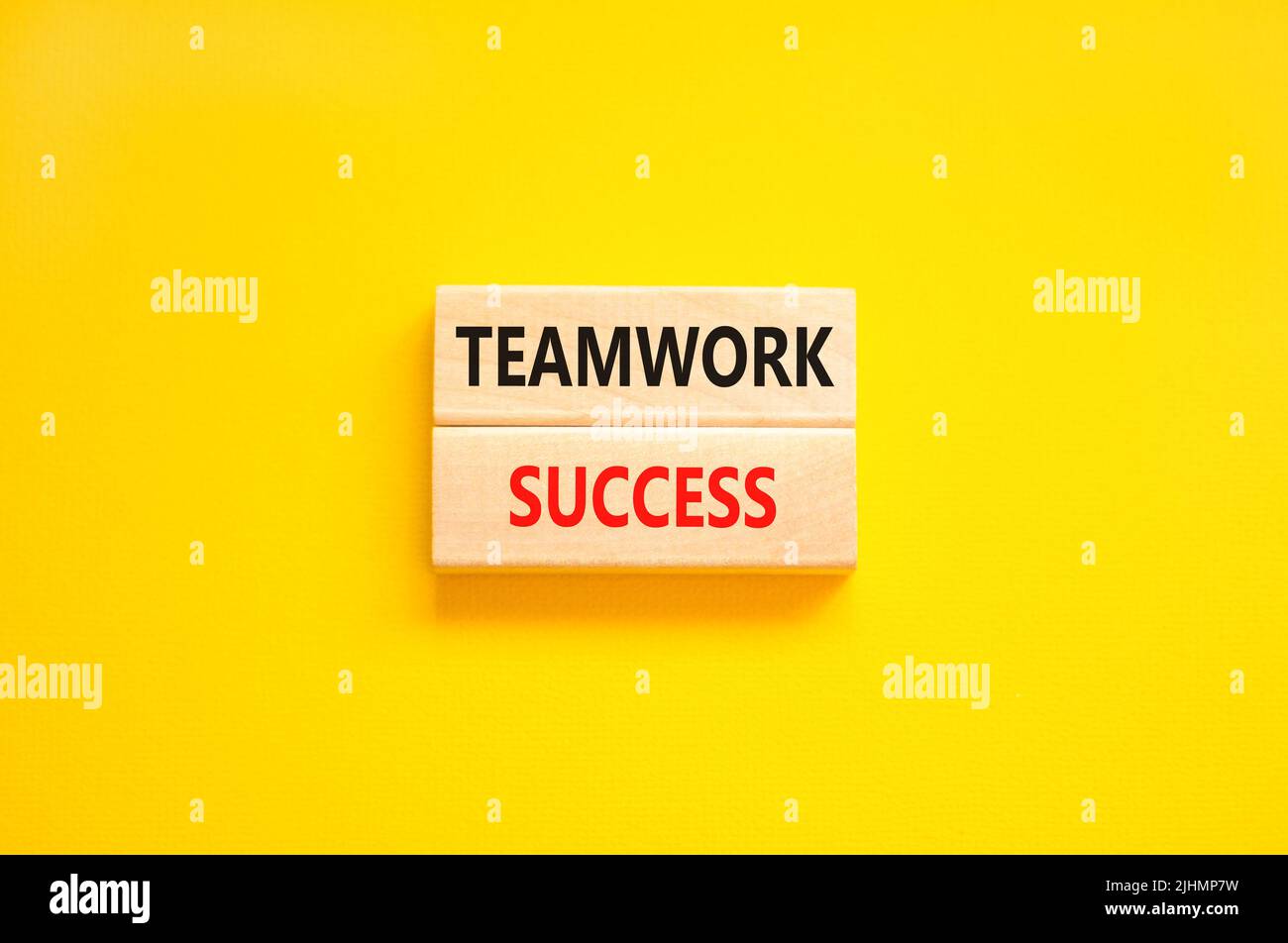 Teamwork success symbol. Concept words Teamwork success on wooden ...