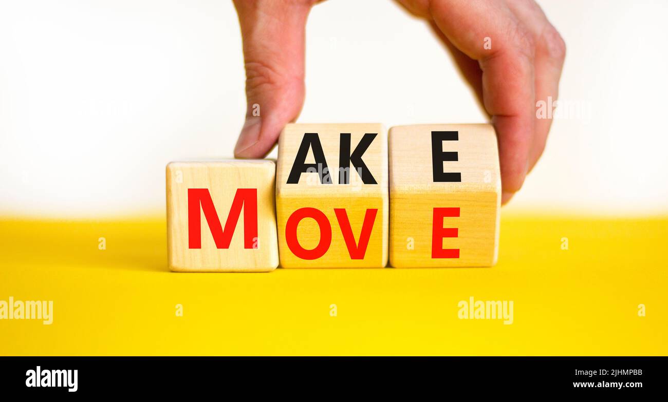 Make your move symbol. Businessman turns wooden cubes with concept ...