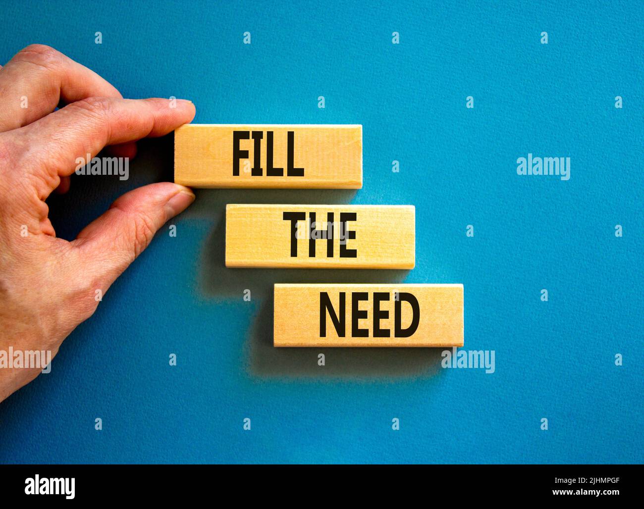 Fill the need symbol. Concept words Fill the need on wooden blocks on a ...