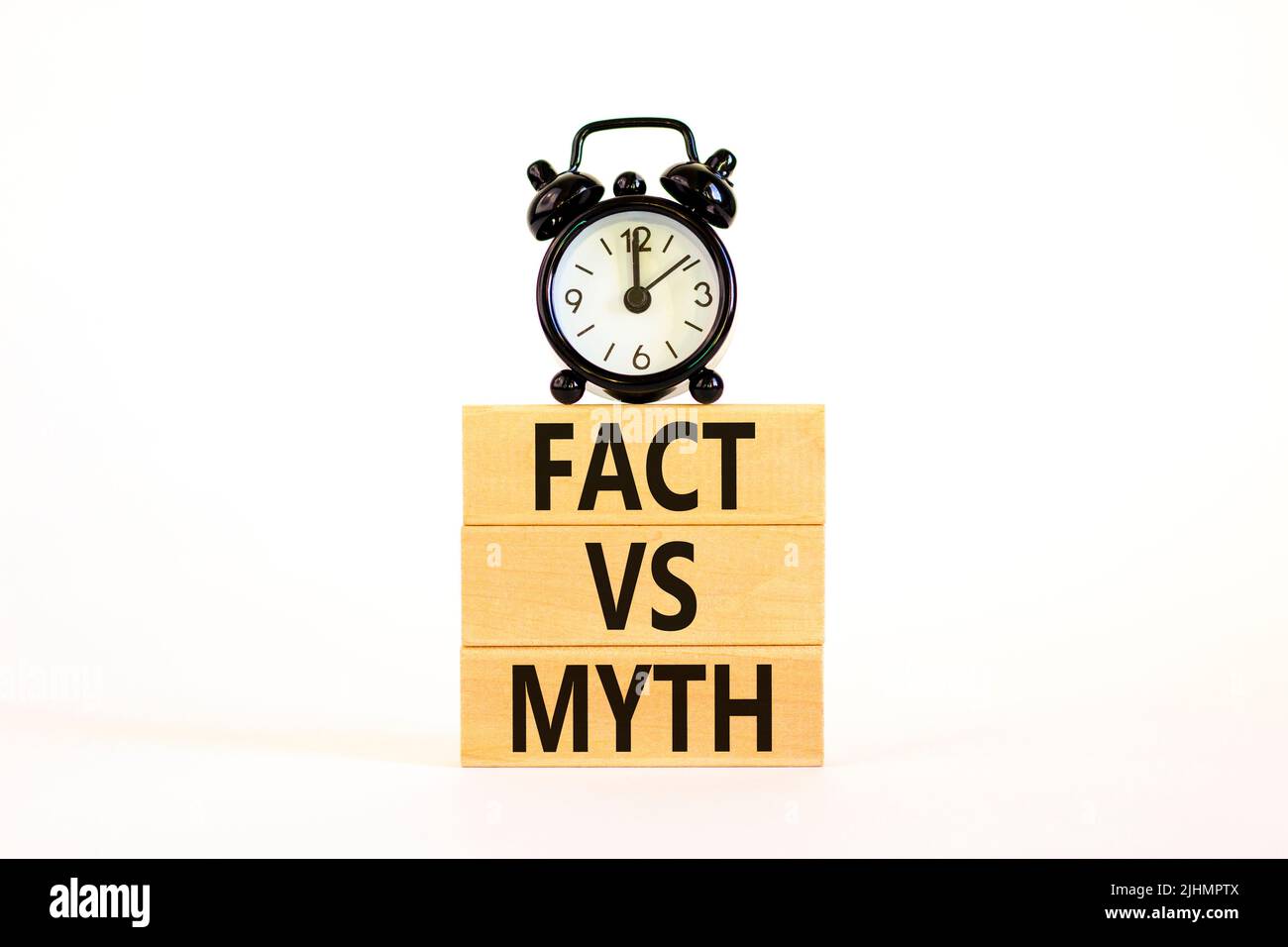 Fact vs myth symbol. Concept words Fact vs myth on wooden blocks on a ...