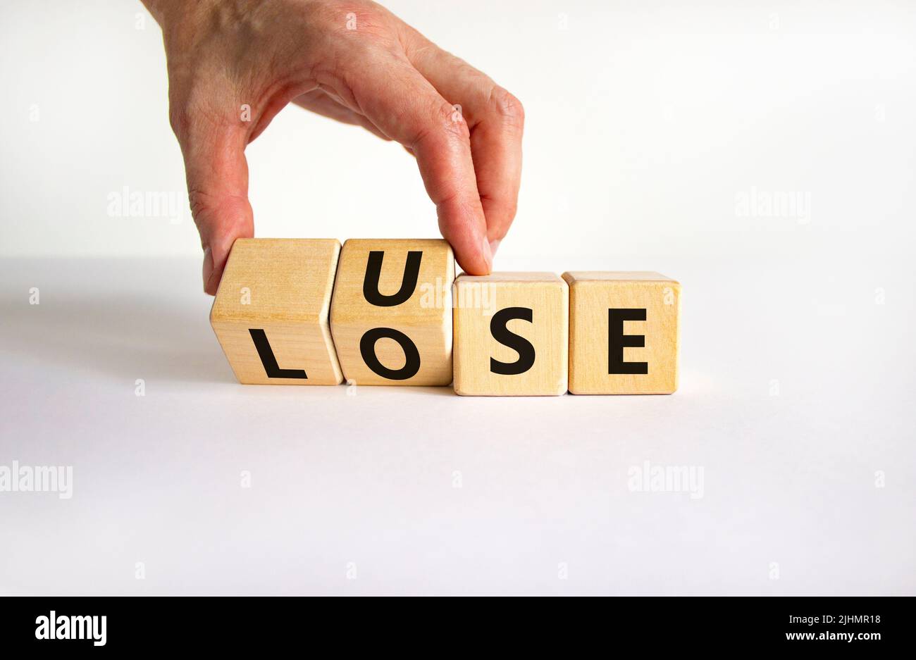 Use or lose symbol. Concept words Use or lose on wooden cubes ...