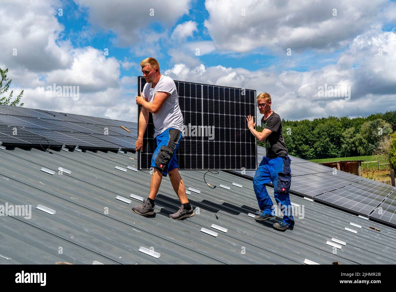 Installation of solar modules on the roof of a barn, a farm, over 240 ...