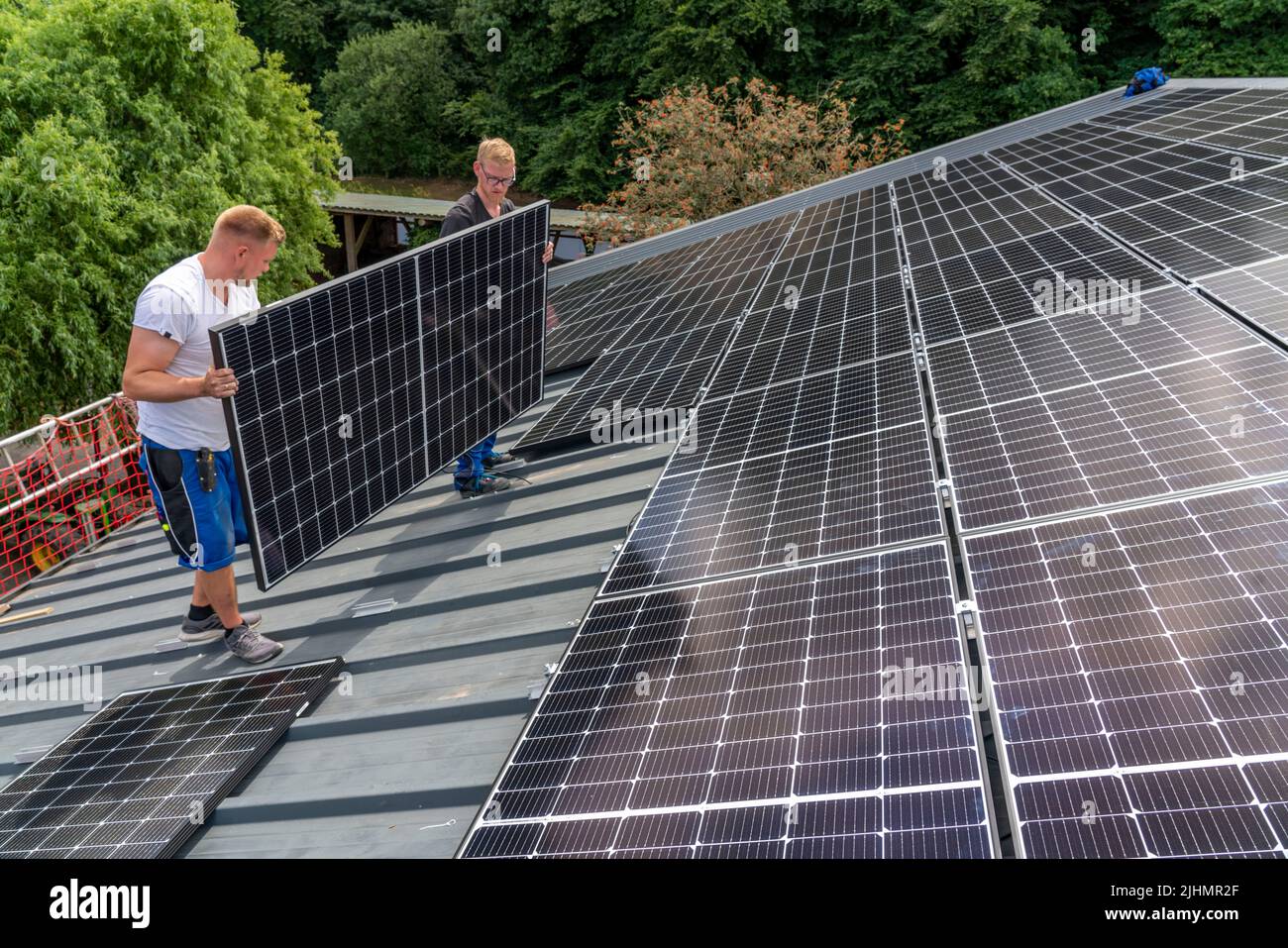 Installation of solar modules on the roof of a barn, a farm, over 240 ...