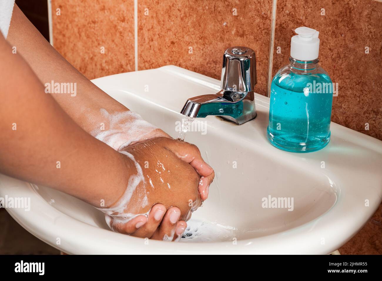 Health & Wellness; Washing and disinfection of hands Stock Photo - Alamy