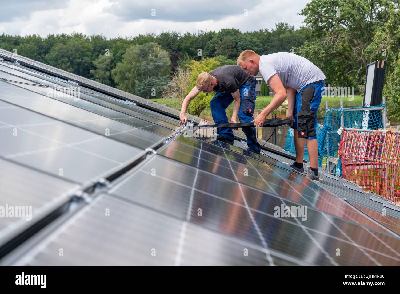 Installation of solar modules on the roof of a barn, a farm, over 240 ...