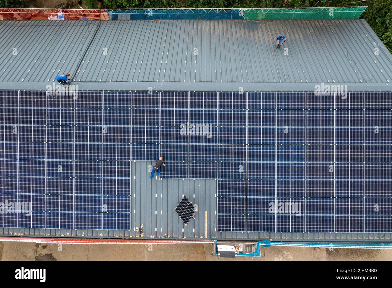 Installation of solar modules on the roof of a barn, a farm, over 240 ...
