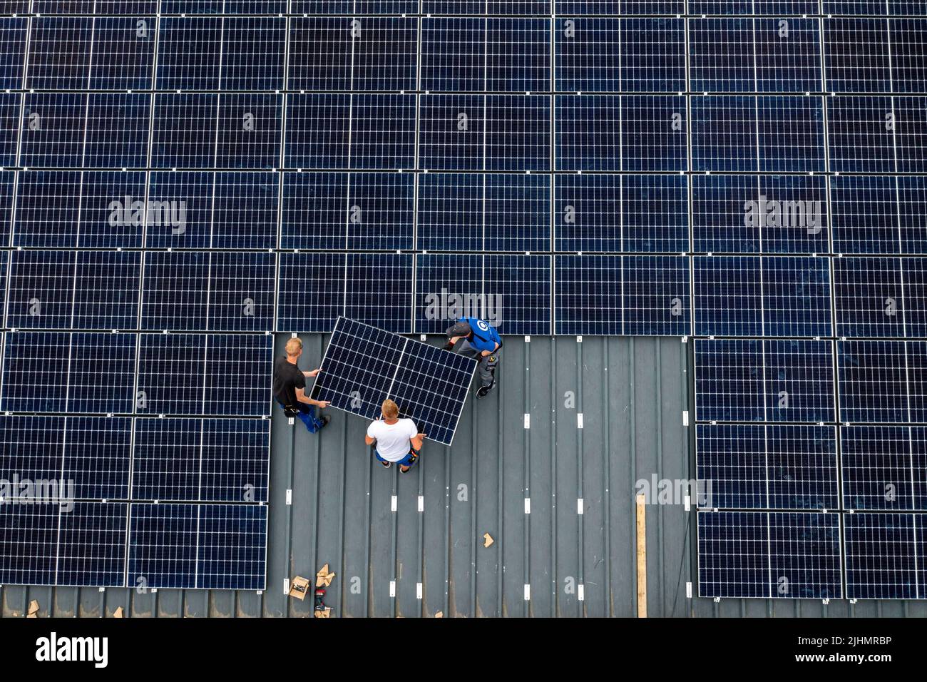 Installation of solar modules on the roof of a barn, a farm, over 240 ...