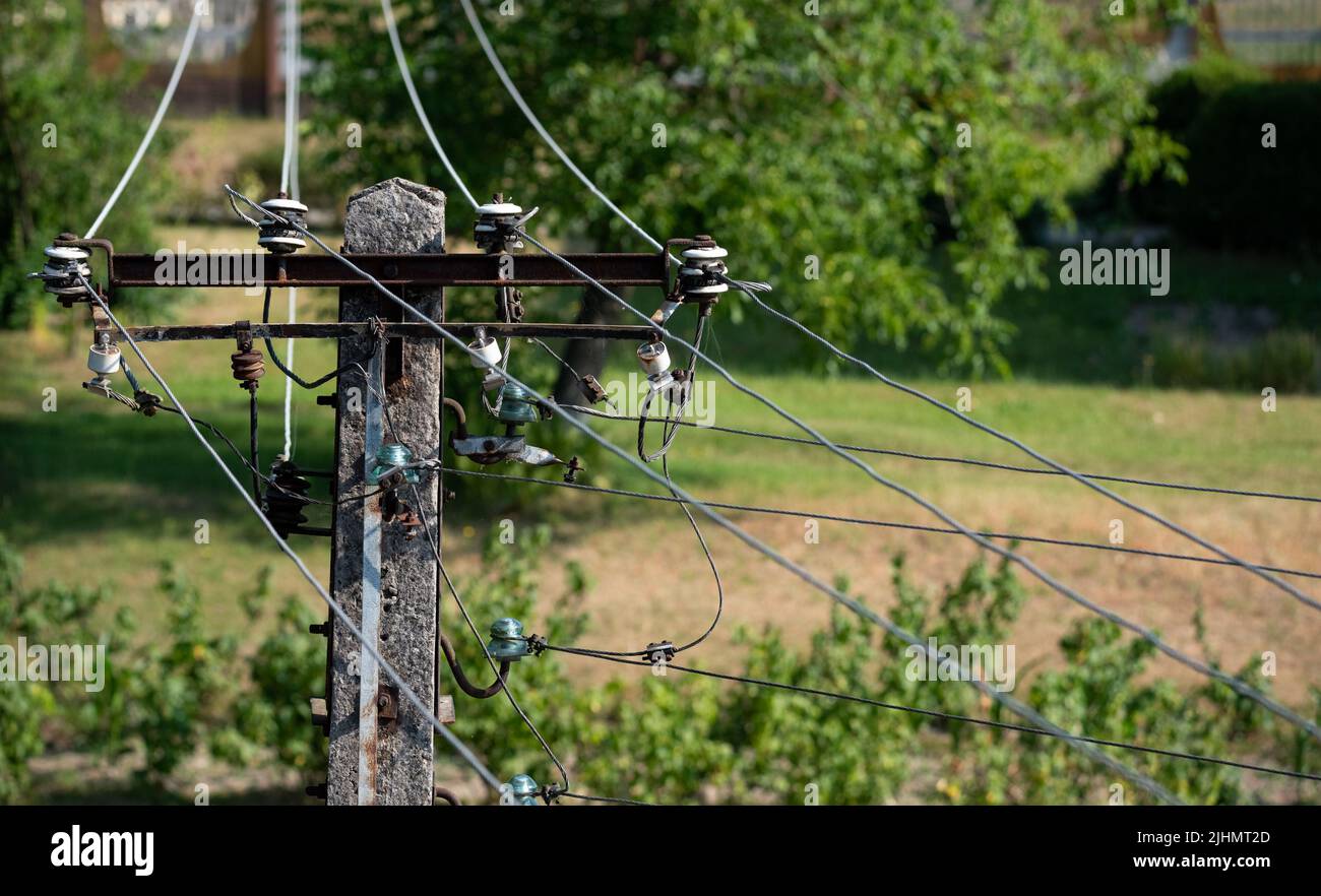 Electrical network. Pole with electric wires. Electric wires on with ...