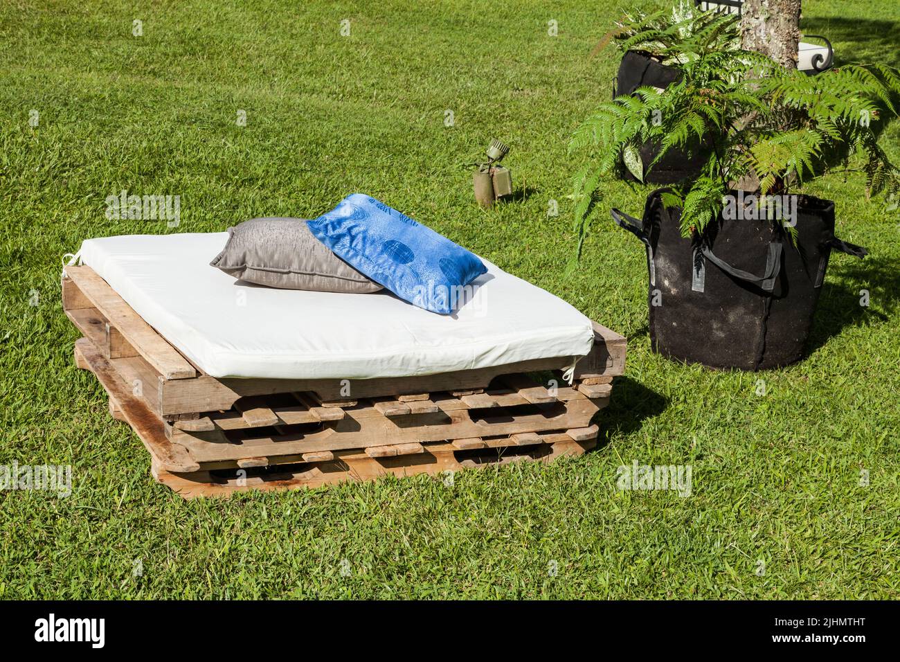 Lounge area for guests outside, improvised sofas Stock Photo - Alamy