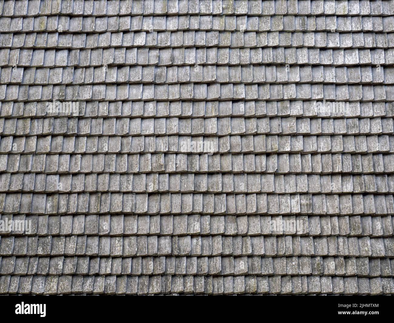 texture of traditional wooden roof tiles of an old European house Stock ...