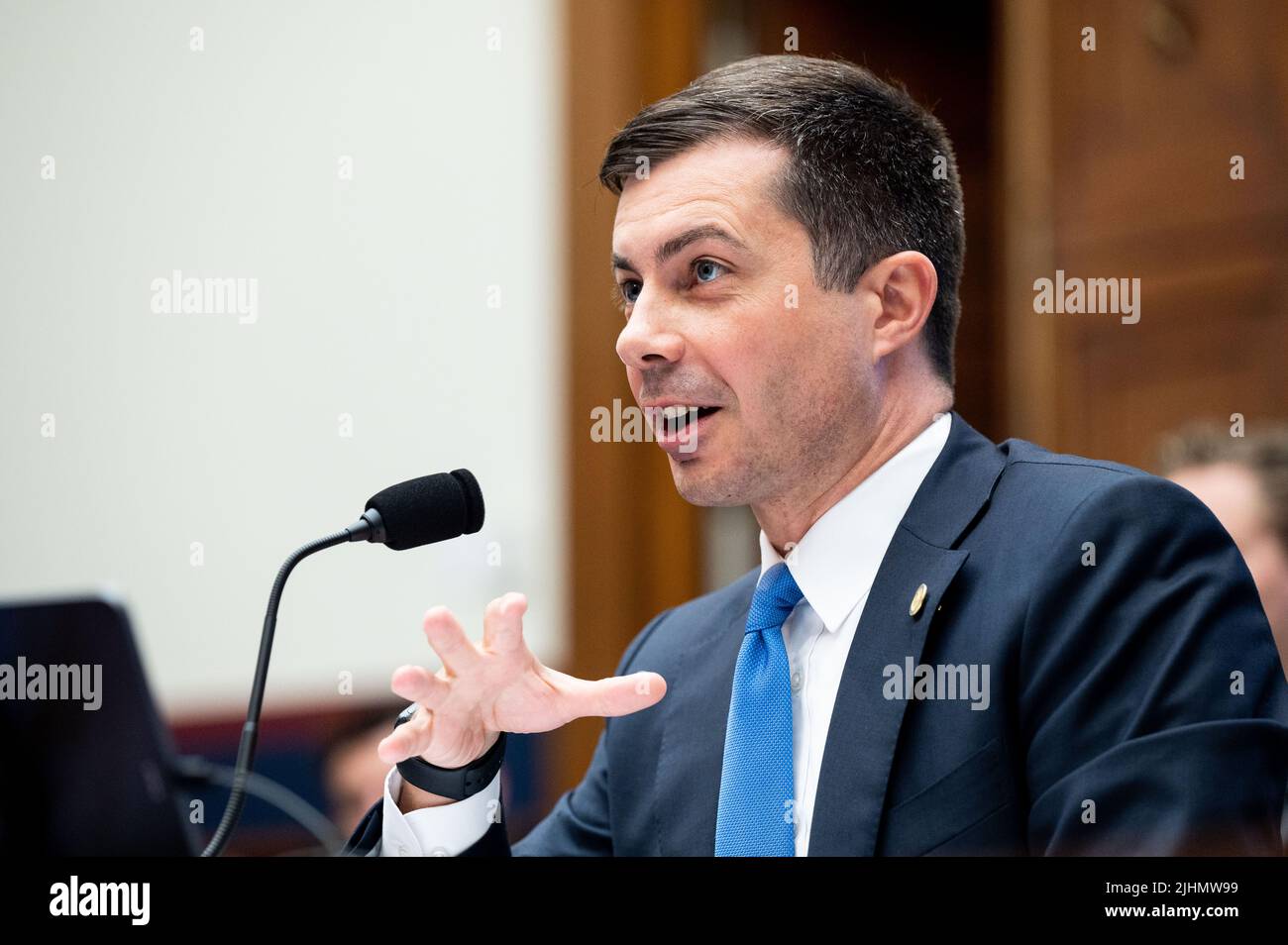 U.S. Secretary of Transportation Pete Buttigieg speaking at a hearing ...