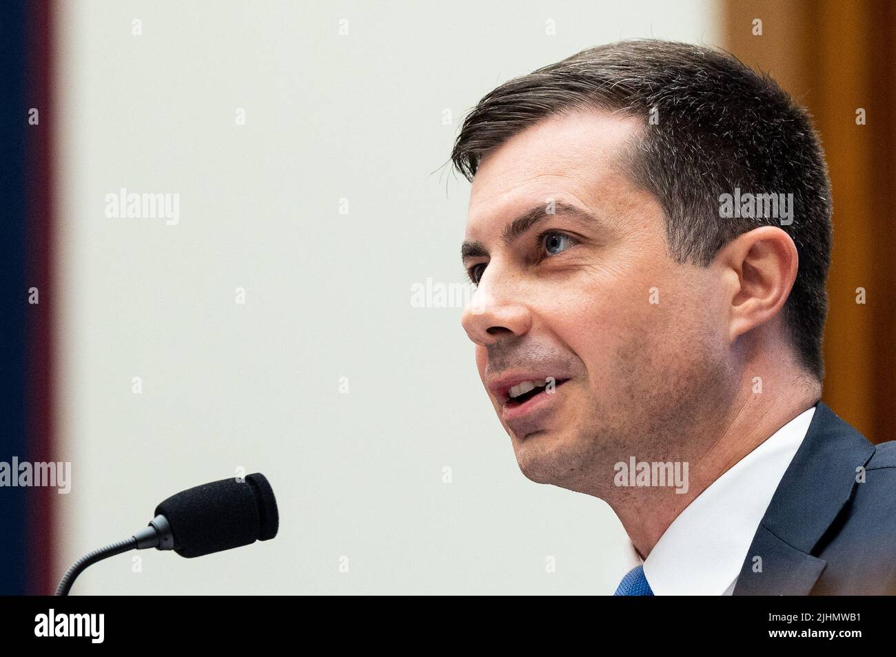 U.S. Secretary of Transportation Pete Buttigieg speaking at a hearing ...