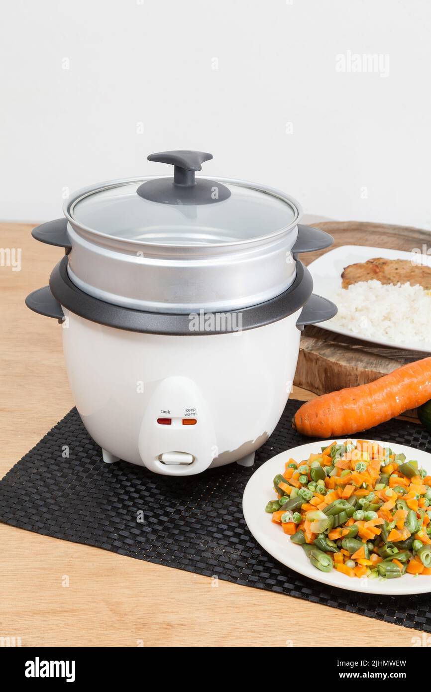 Cooking utensil; Automatic electric pot Stock Photo - Alamy