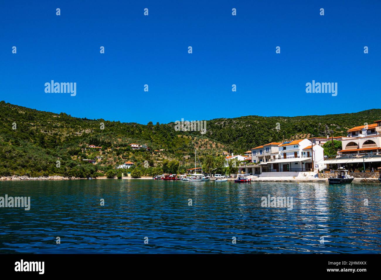 Seaside view of Steni Vala coastal village in Alonissos island ...