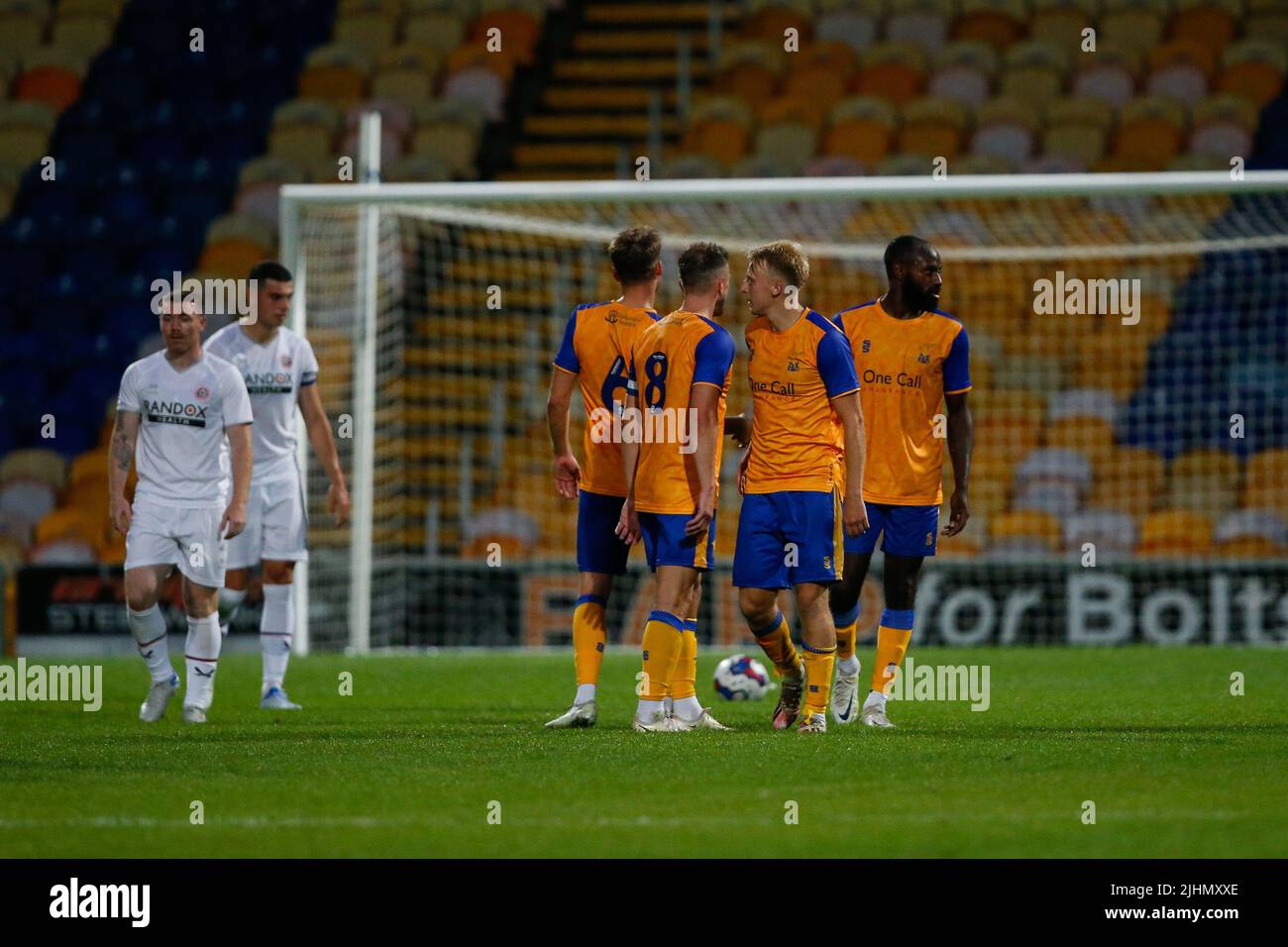 Players of Mansfield Town celebrate scoring a goal to make it 3-0 Stock ...