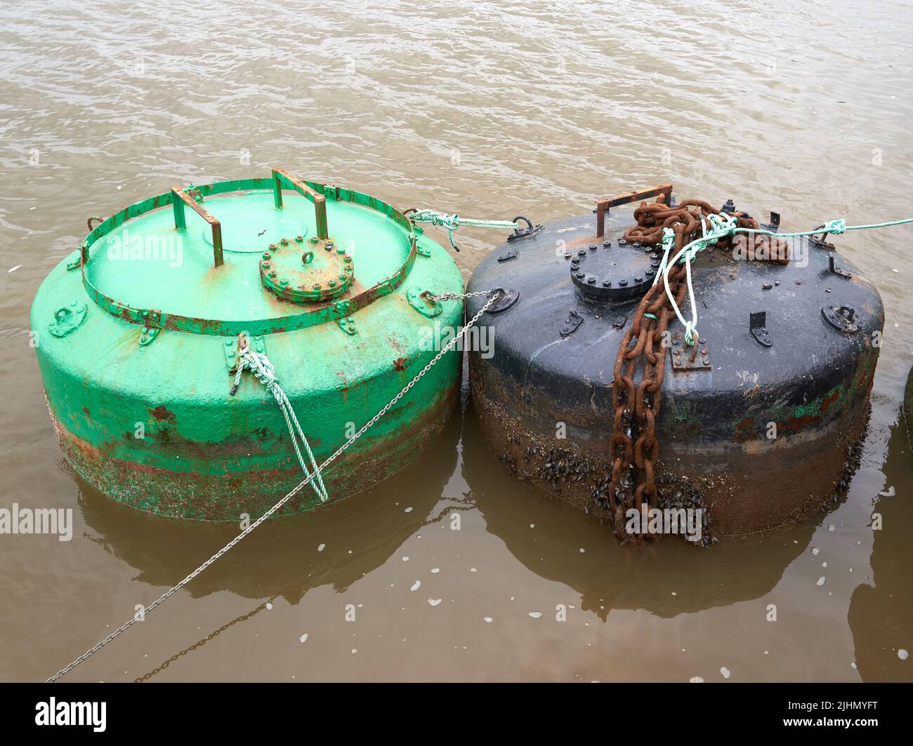 Steel buoys moored in Kings Lynn harbor , Norfolk, UK Stock Photo - Alamy