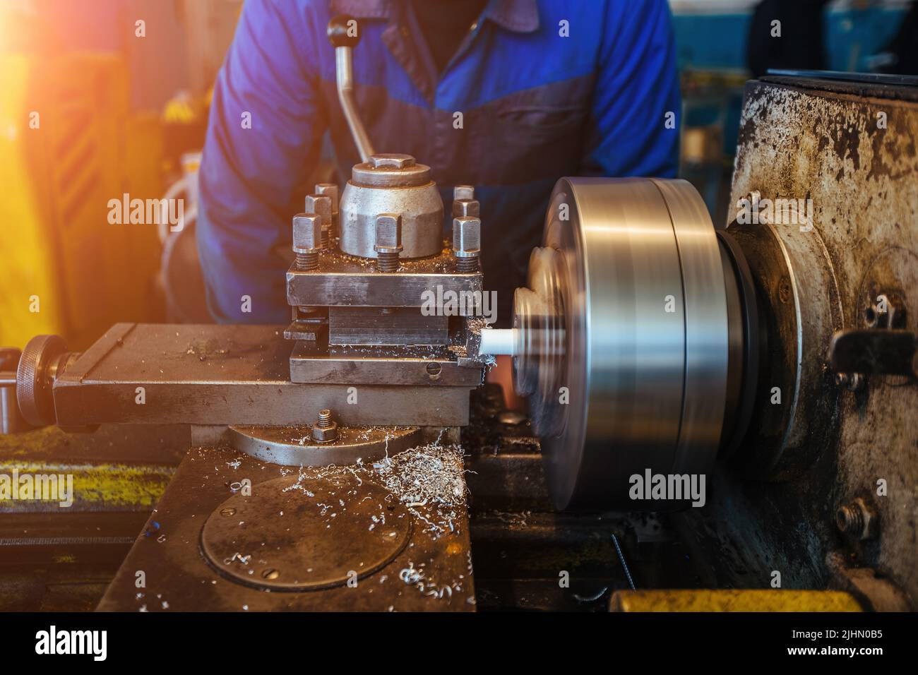 Working lathe in the workshop, close up Stock Photo - Alamy