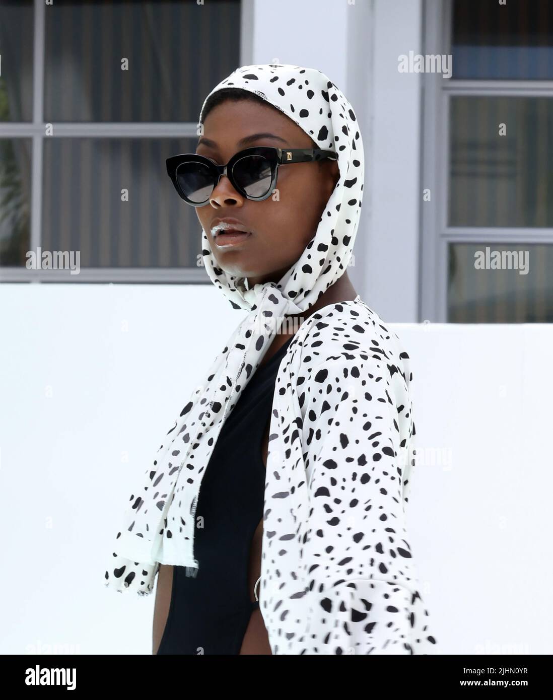 MIAMI BEACH, FLORIDA - JULY 18: A model walks the runway wearing CYAR ...
