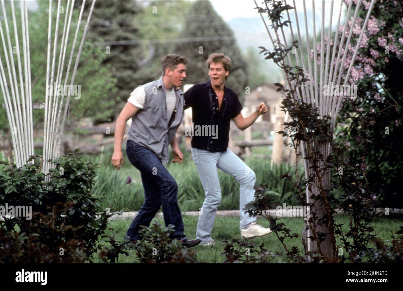 CHRIS PENN, KEVIN BACON, FOOTLOOSE, 1984 Stock Photo - Alamy