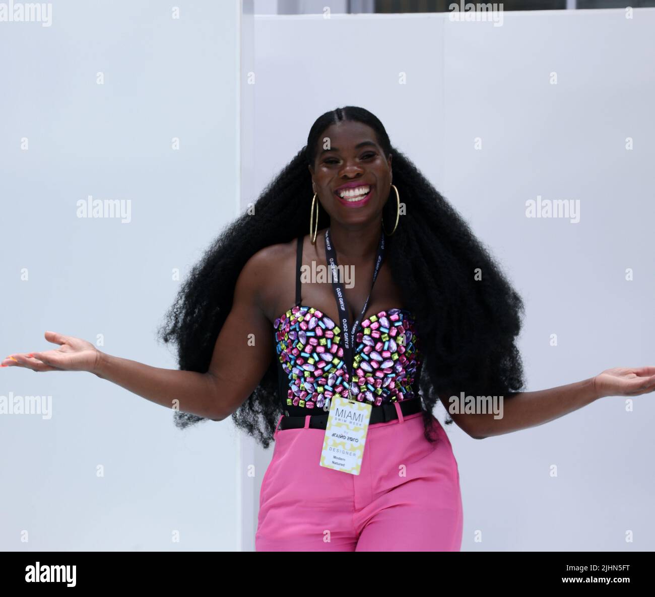 MIAMI BEACH, FLORIDA - JULY 18: Designer walks the runway for CYAR ...