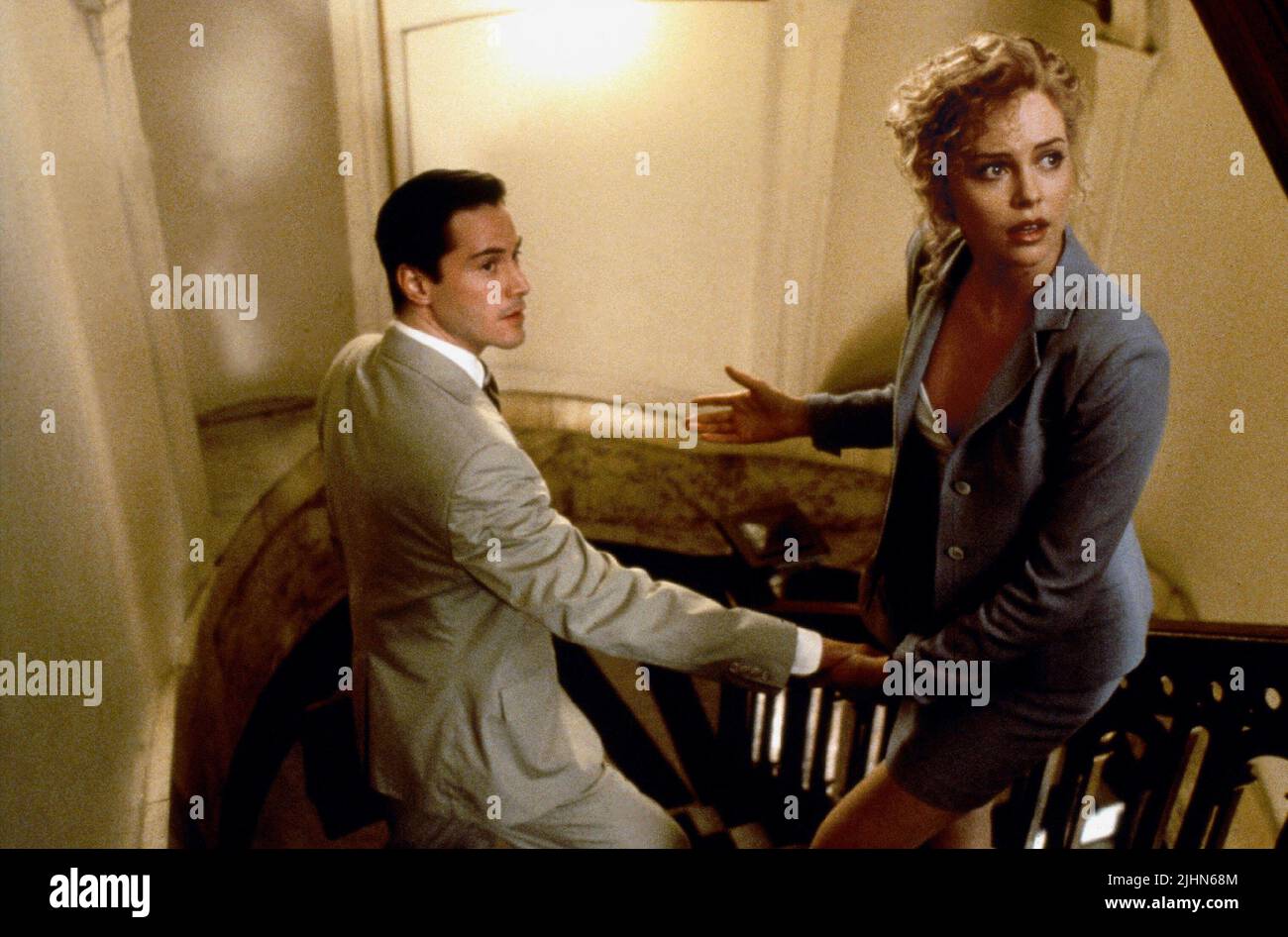 KEANU REEVES, CHARLIZE THERON, THE DEVIL'S ADVOCATE, 1997 Stock Photo ...