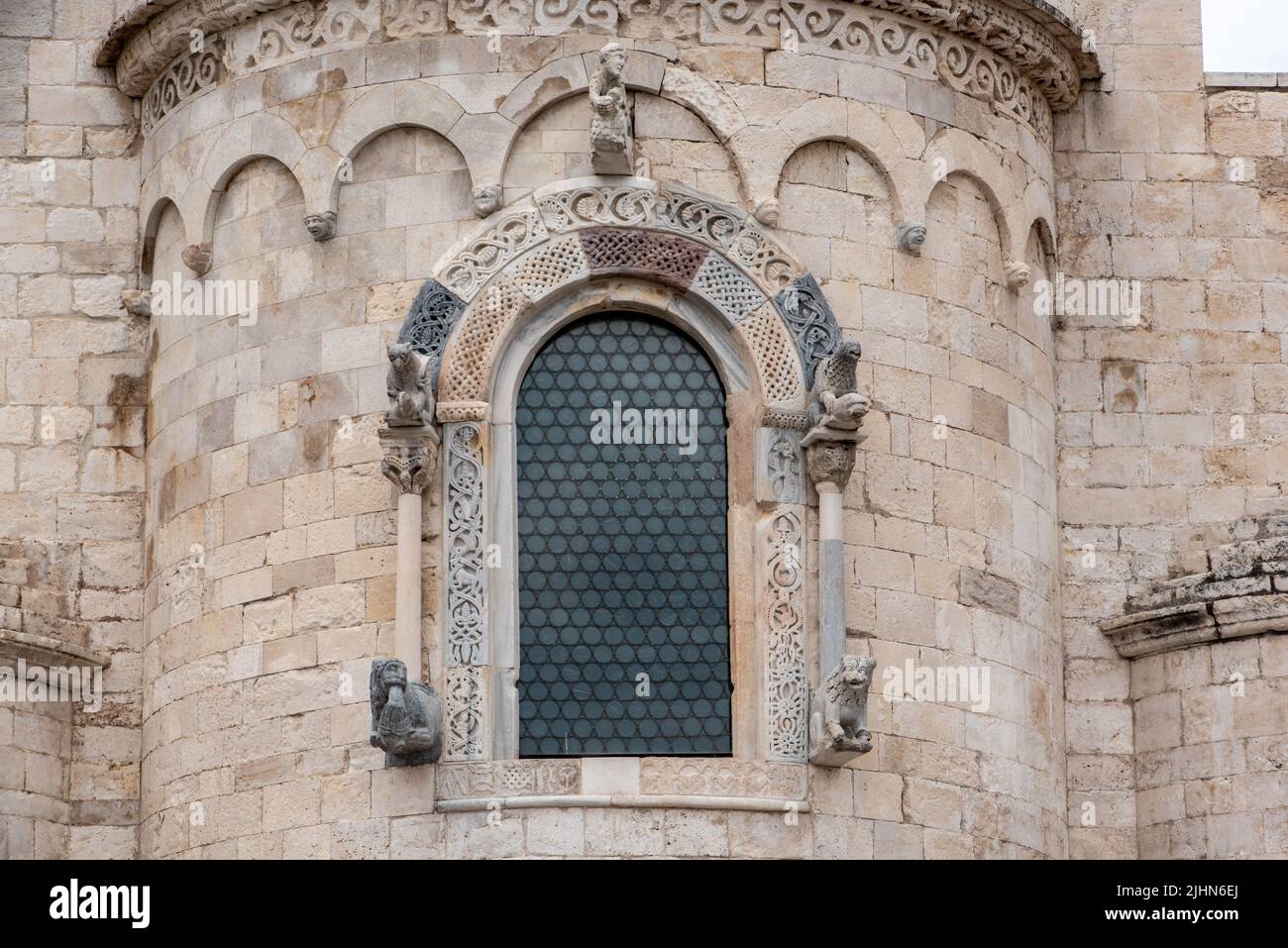 Exterior window of a romanesque church in Trani, Southern Italy Stock ...