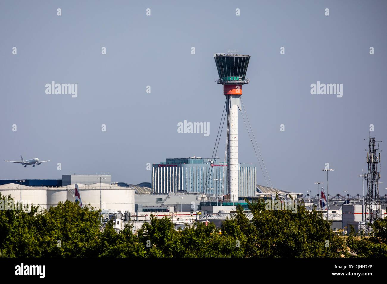 London, UK. 19th July, 2022. An aircraft prepares to land at Heathrow ...