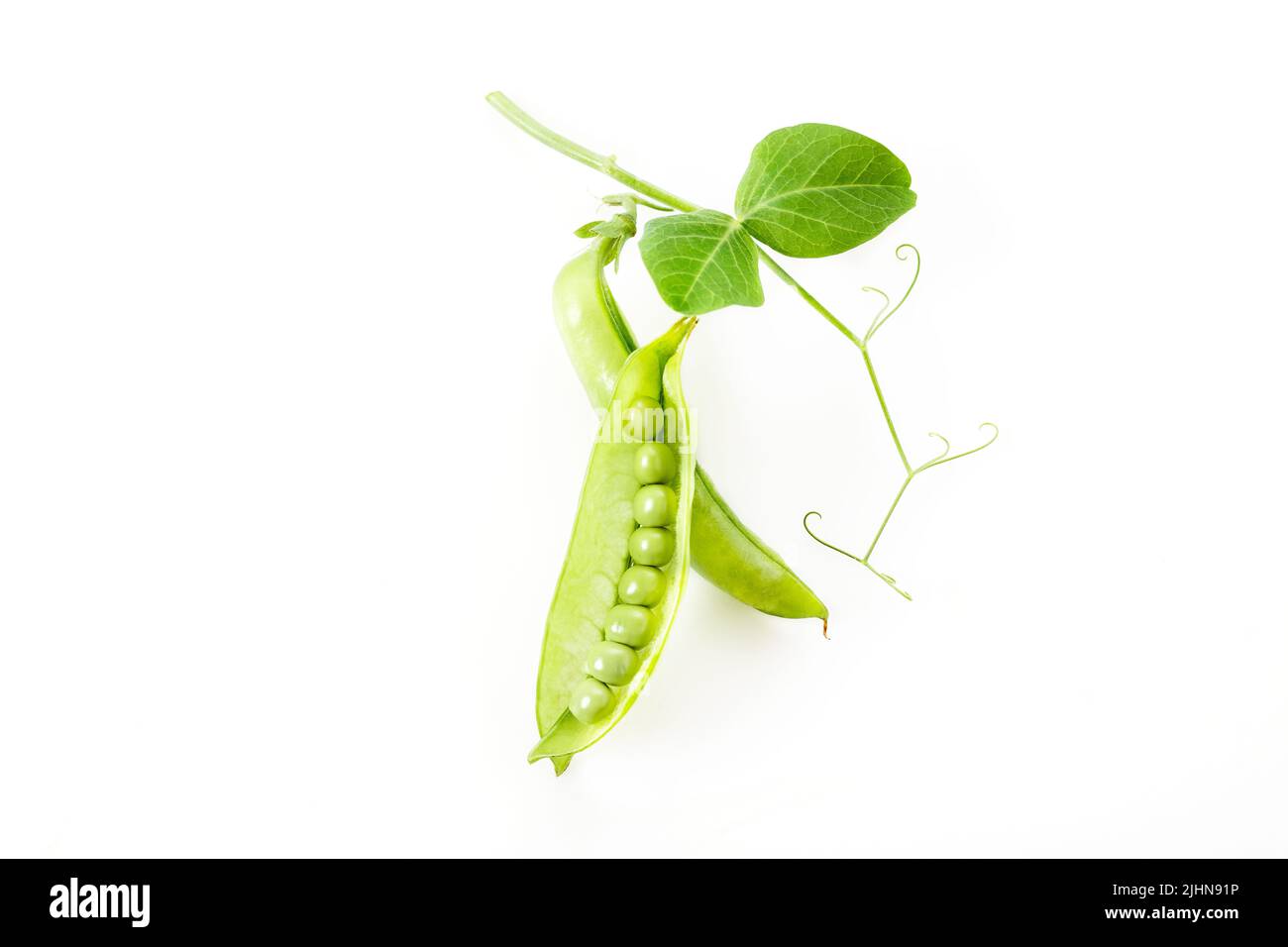 Fresh green peas isolated on white background Stock Photo - Alamy