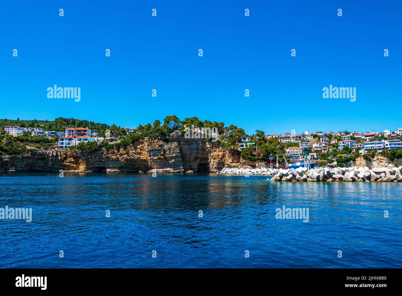 Boat trip view towards the famous caves of Votsi beach in Alonnisos ...