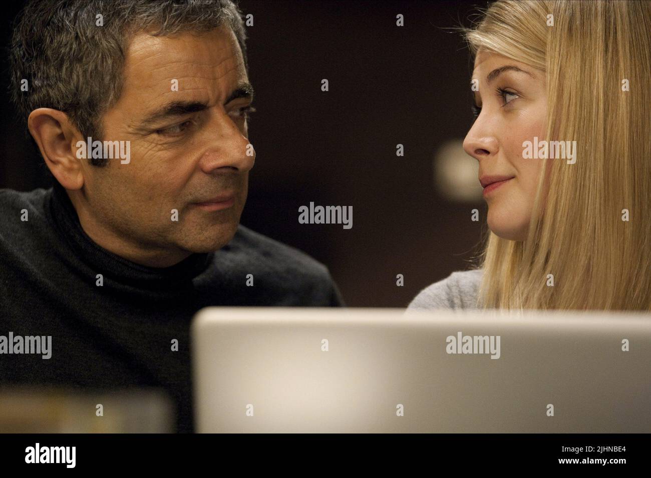 ROWAN ATKINSON, ROSAMUND PIKE, JOHNNY ENGLISH REBORN, 2011 Stock Photo ...