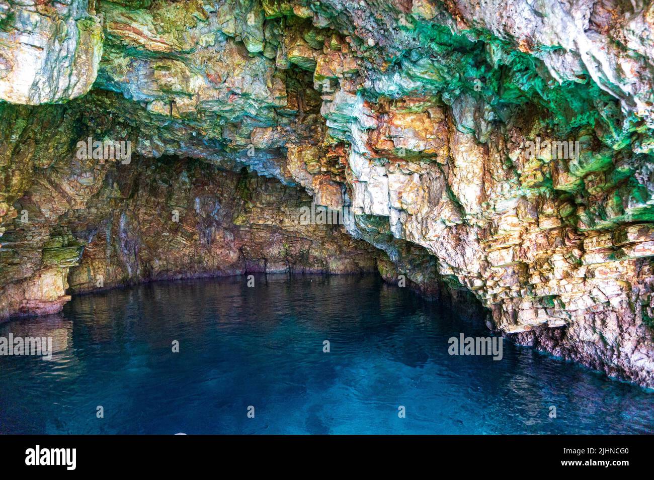 Boat trip view towards the famous caves of Votsi beach in Alonnisos ...