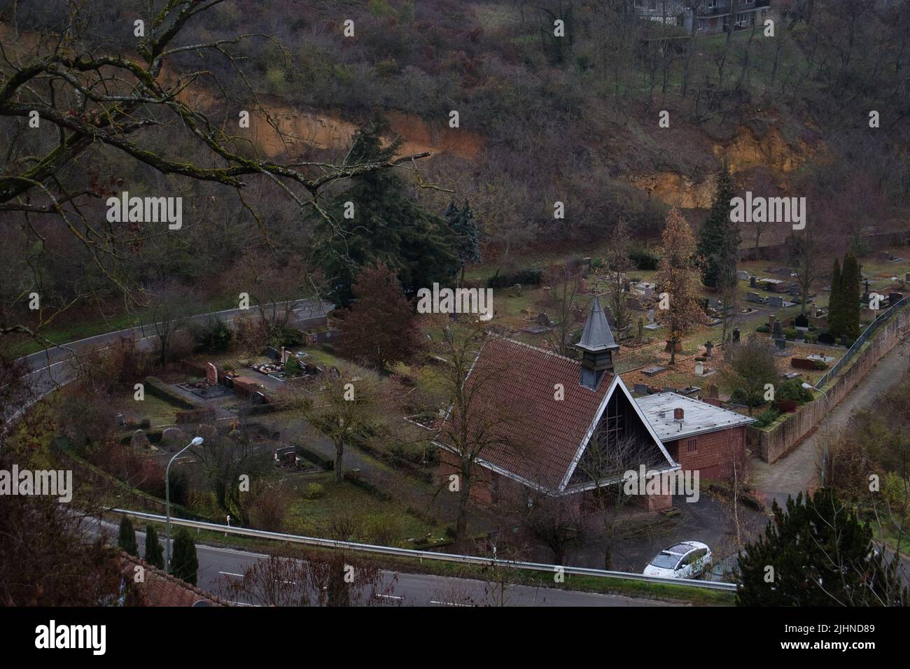 Neuleiningen, Germany - December 2, 2020: Overlooking a cemetery with a ...