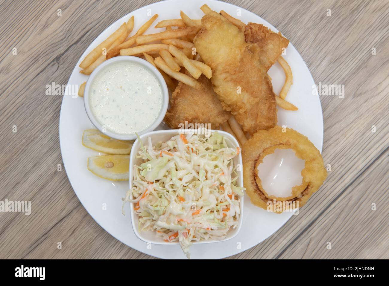 Overhead view of tempting deep fried meal consisting of shrimp, fish ...