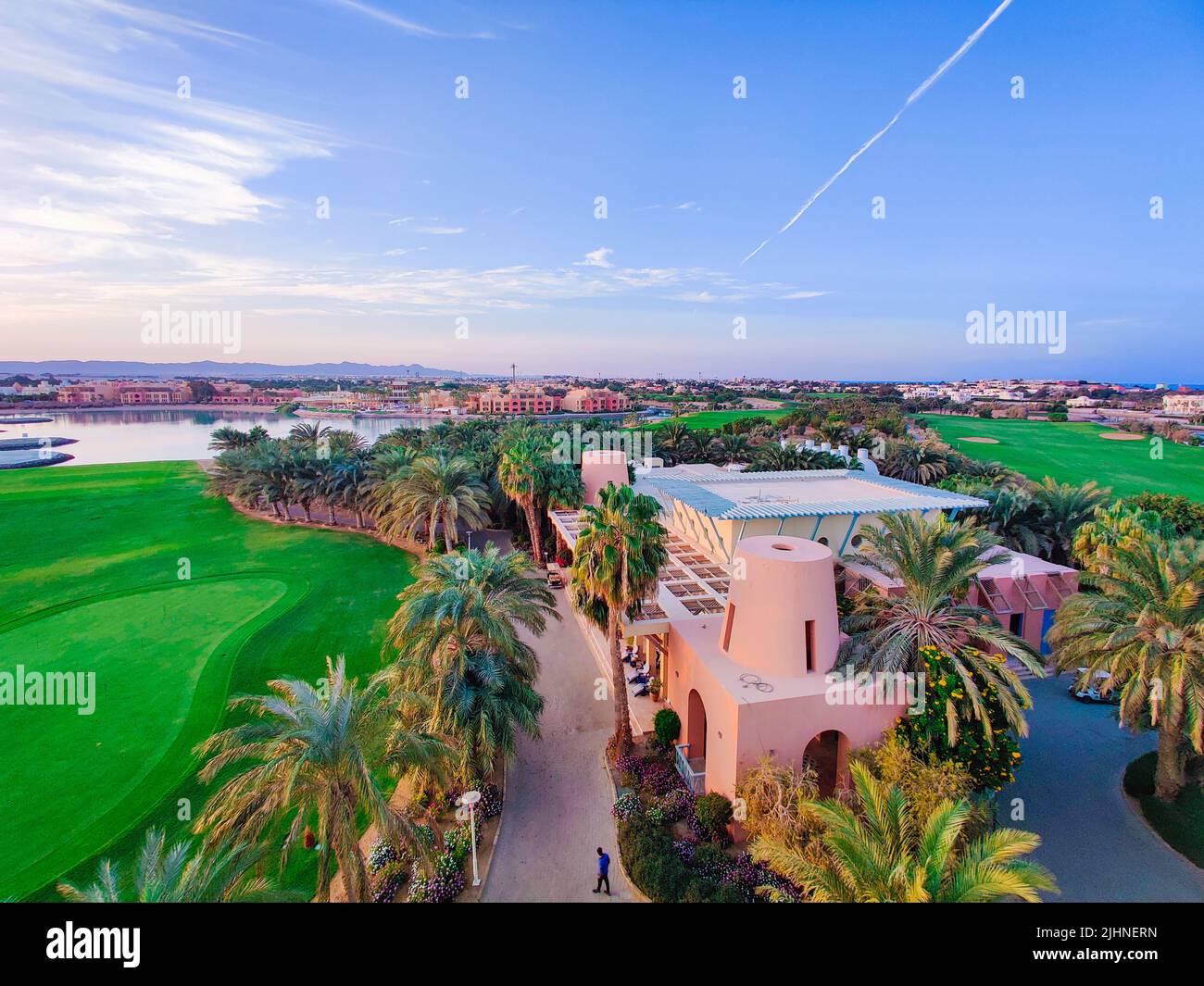 Green Field with the Colorful Sky at Sunset - Showing the amazing ...