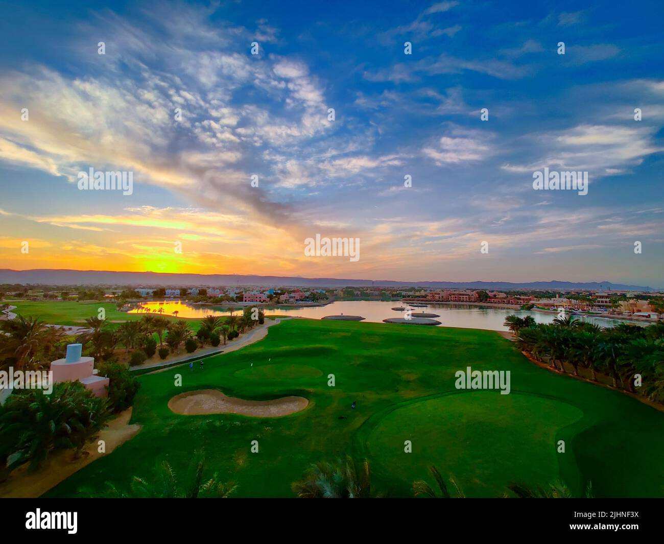 Green Field with the Colorful Sky at Sunset - Showing the amazing ...