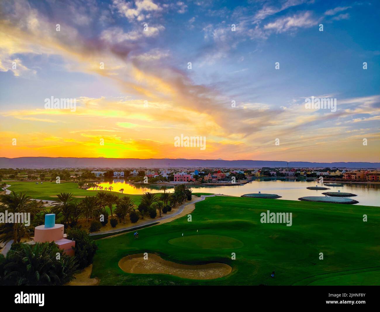 Green Field with the Colorful Sky at Sunset - Showing the amazing ...