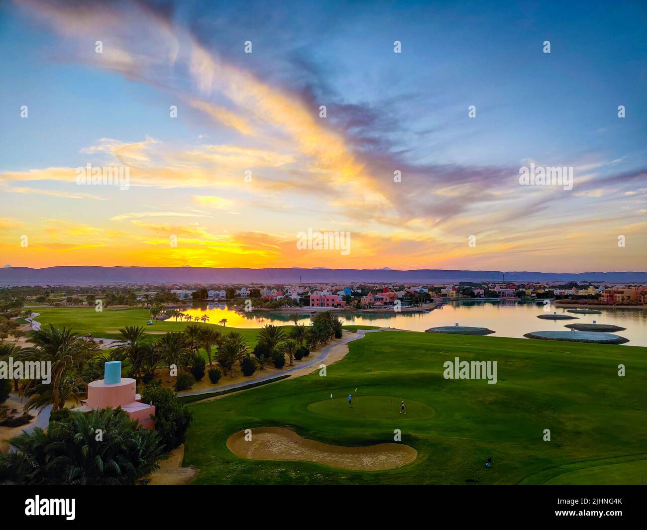 Green Field with the Colorful Sky at Sunset - Showing the amazing ...
