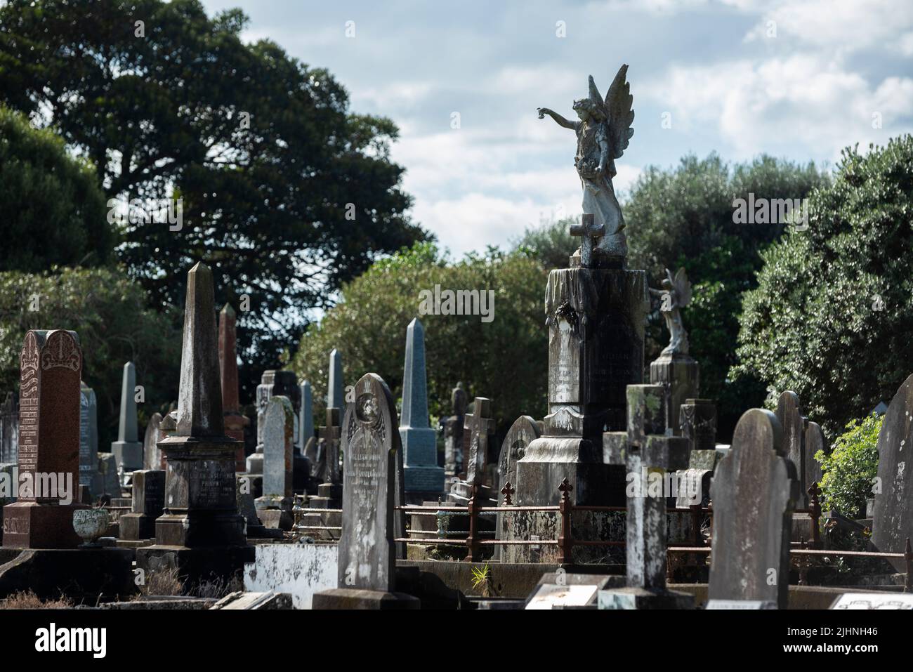 An angel statue in part of Waikaraka cemetery in Auckland, New Zealand ...