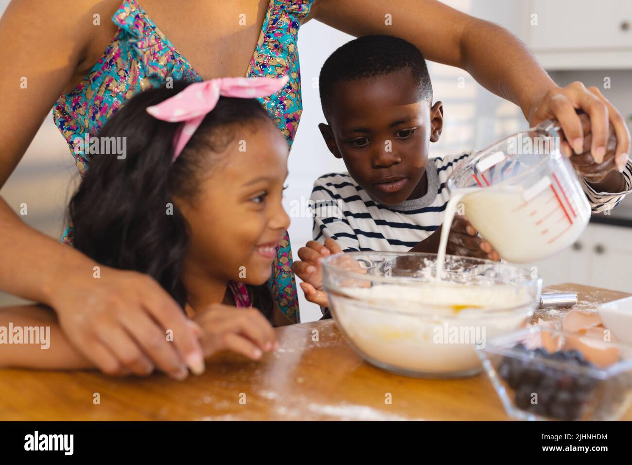 Kid Pouring Milk