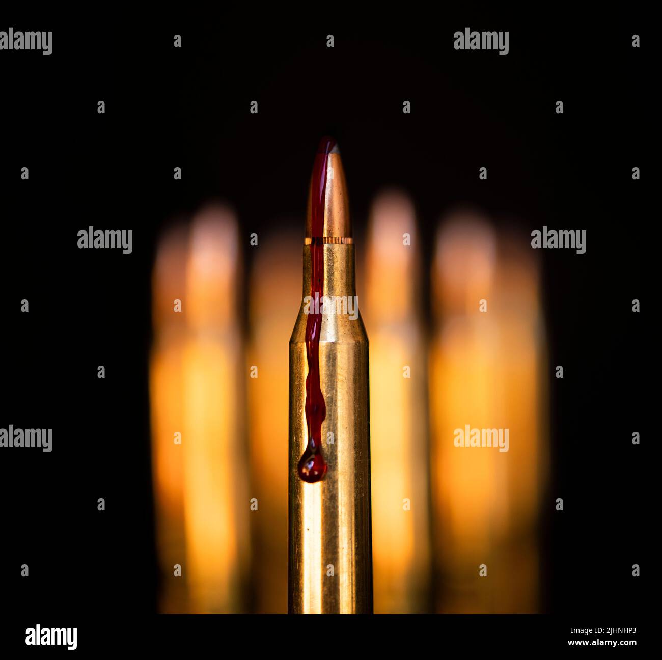 AR-15 style rifle cartridge and blood (photoillustration Stock Photo ...